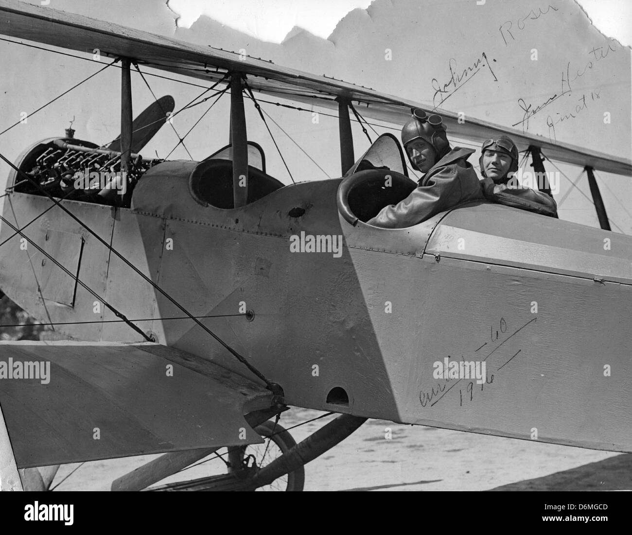 This image captures Johnny Rose and Jim Hester flying a Curtiss trainer ...