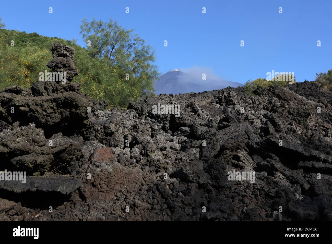 Catania, Italy, lava rock, in the background of the Aetna Stock Photo ...