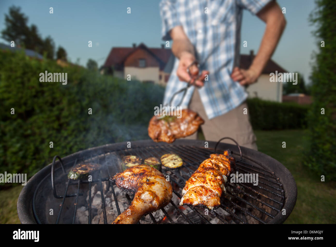 grill cooking out in the backyard Stock Photo - Alamy
