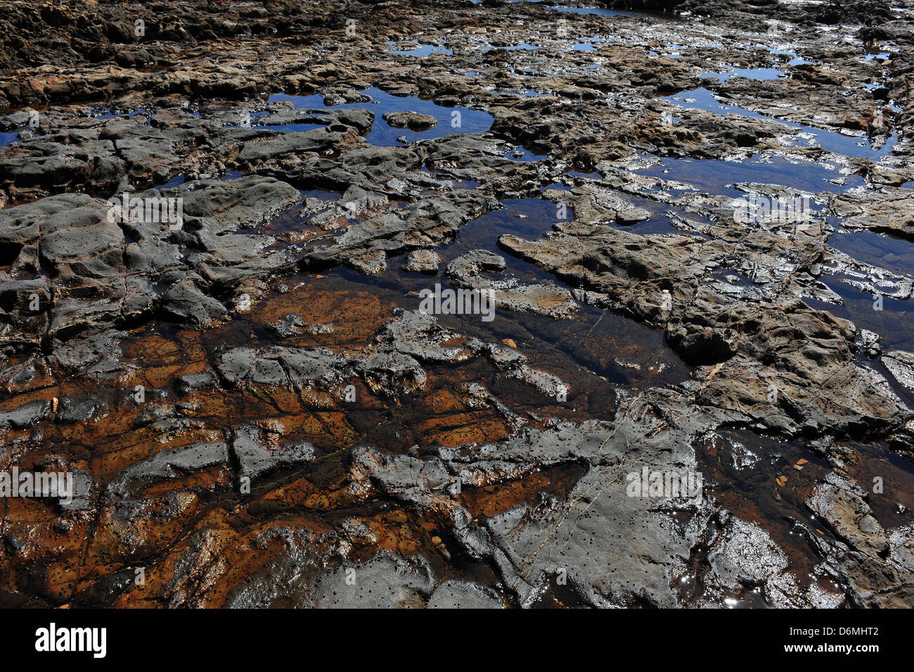 Black lava field background Stock Photo - Alamy