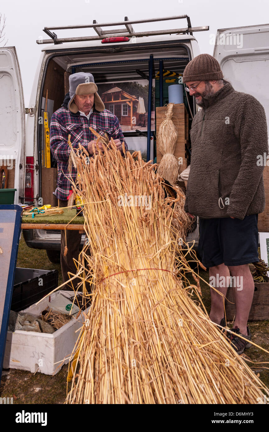 A thatcher demonstrating his craft at the Spring Fling In Norwich ...