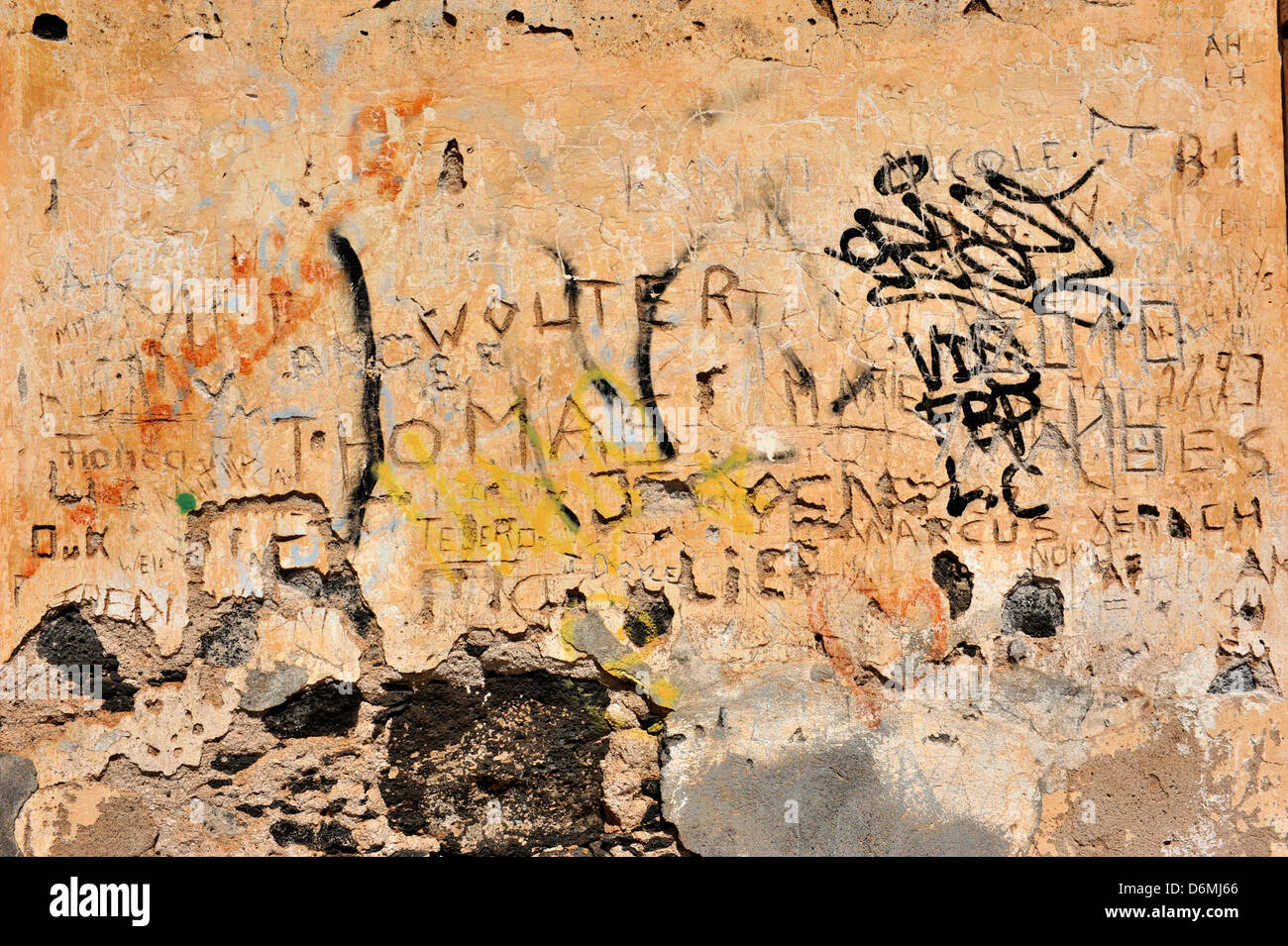 Graffiti on a stone wall Stock Photo - Alamy