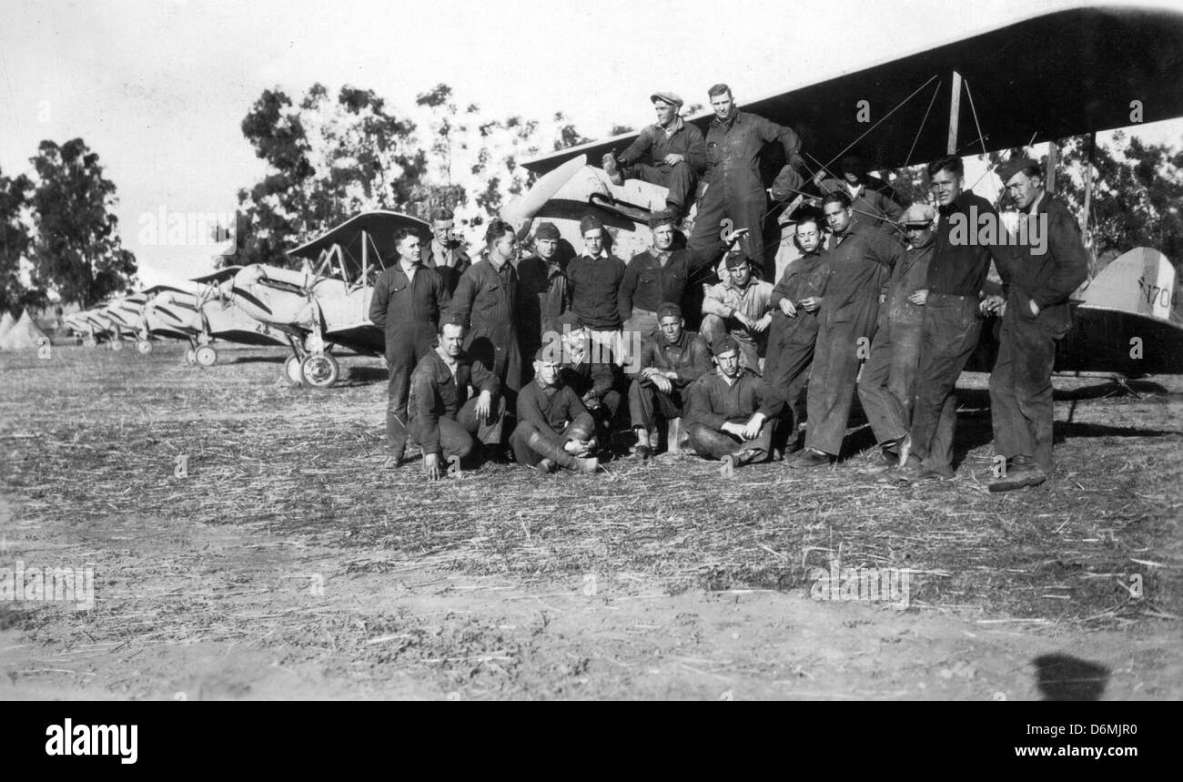 This photograph captures the Waco 9 aircraft with the crew of Lilac ...