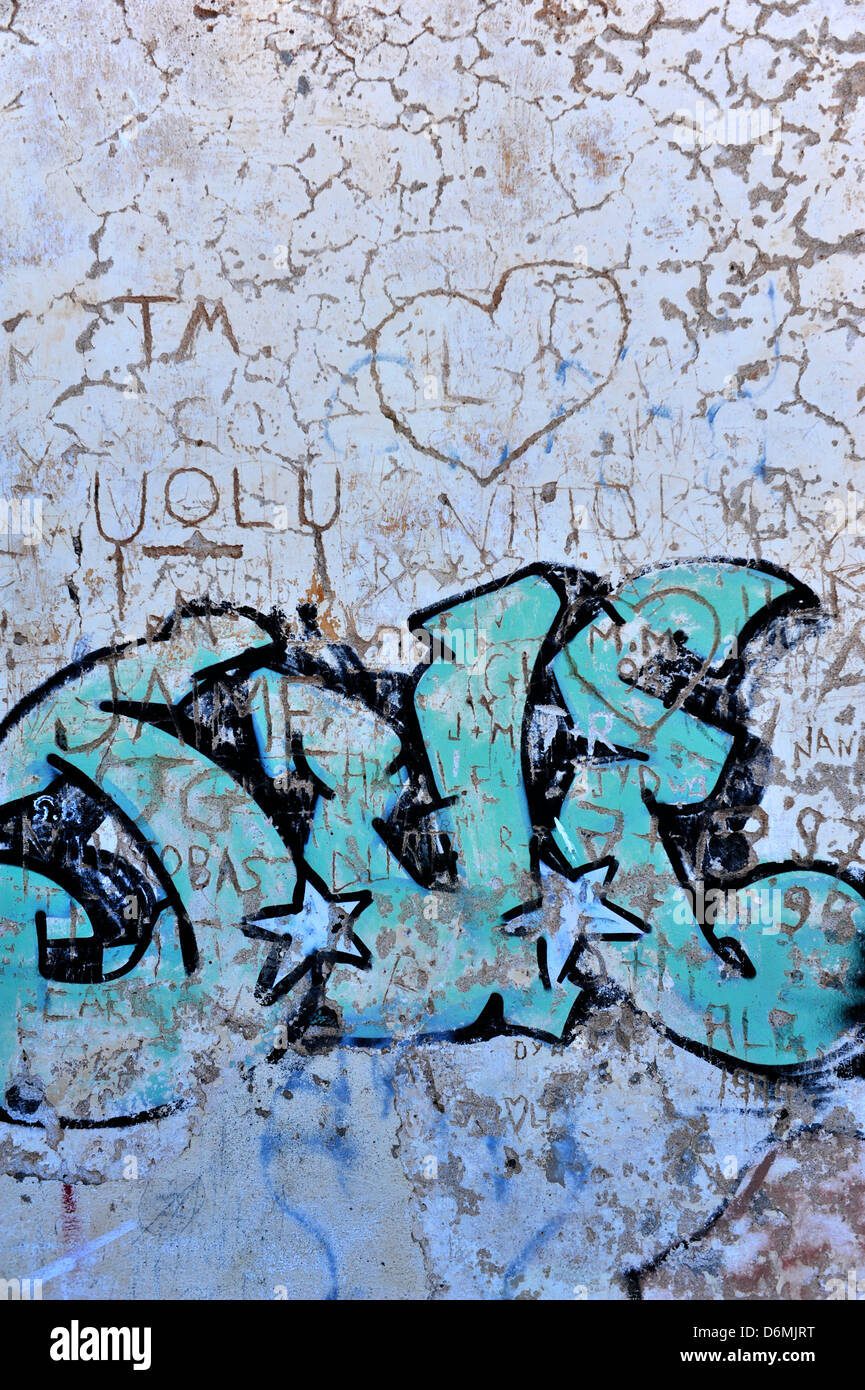 Graffiti on a stone wall Stock Photo - Alamy