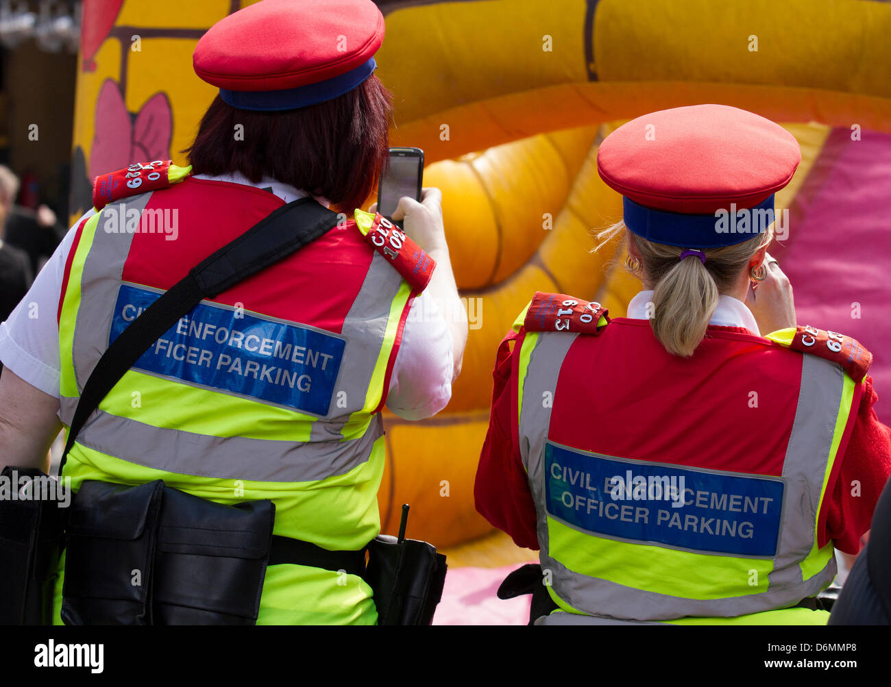 Manchester, UK. 20th April, 2013. Two City Enforcement officers ...