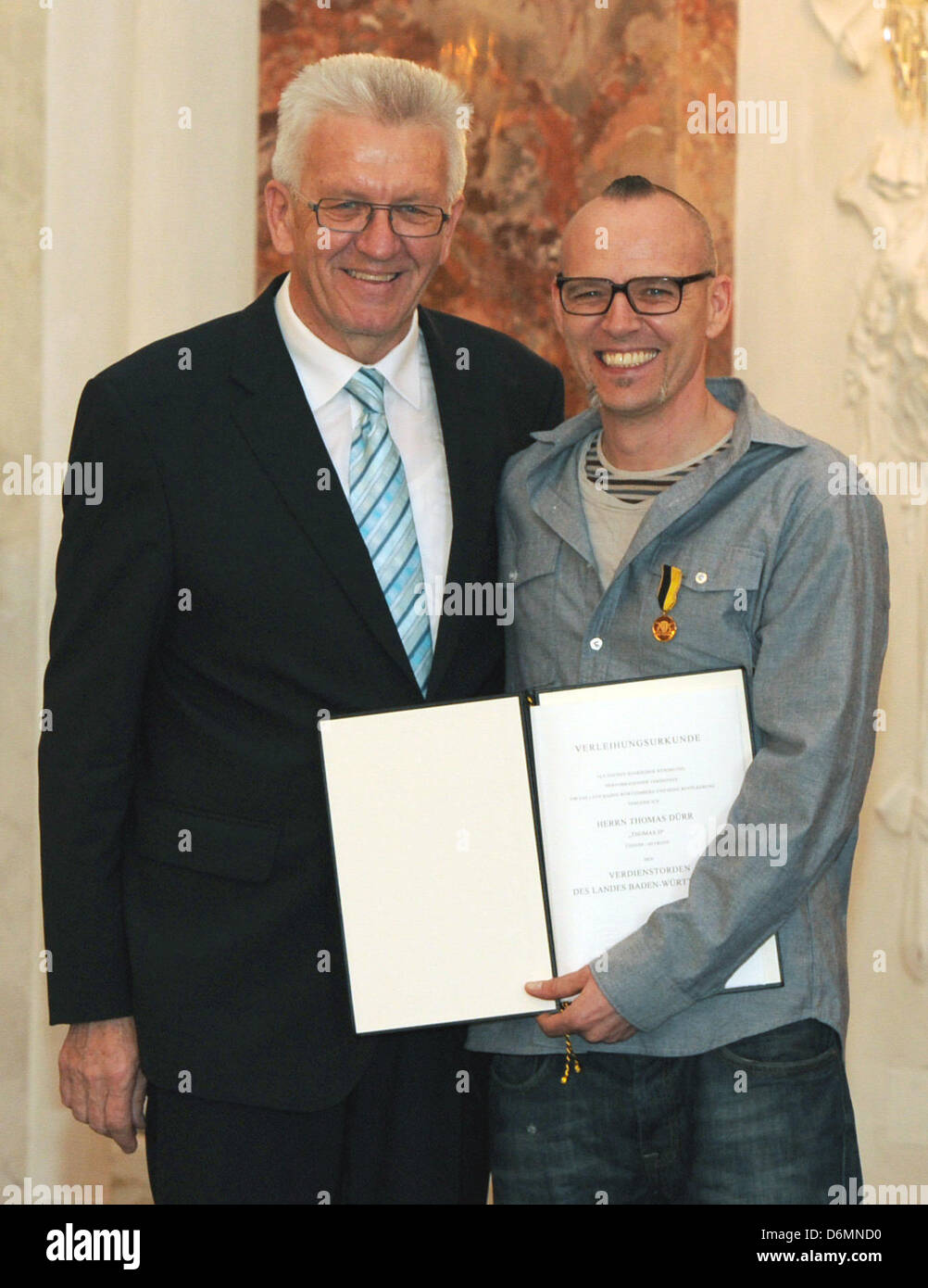 German singer Thomas Duerr (R) poses with the Premier of Baden ...