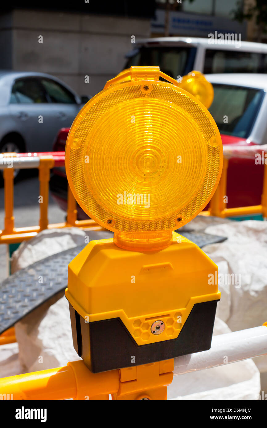 Road construction bright yellow reflector sign. Vertical shot Stock ...