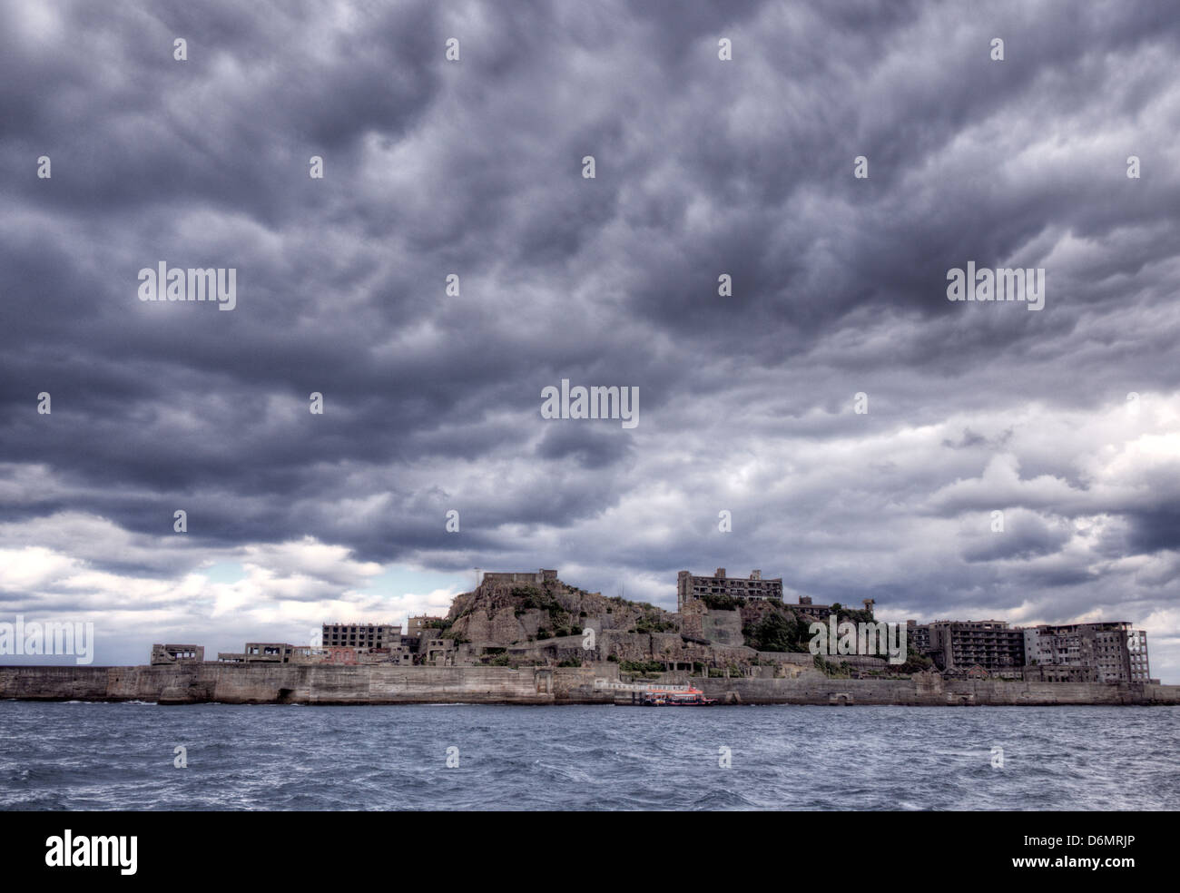 The abandoned mining island of Gunkanjimia in Nagasaki Prefecture ...