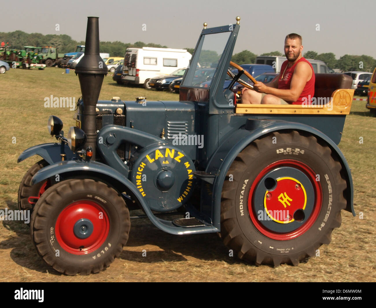The Dark Blue Lanz Bulldog is a classic German tractor known for its ...