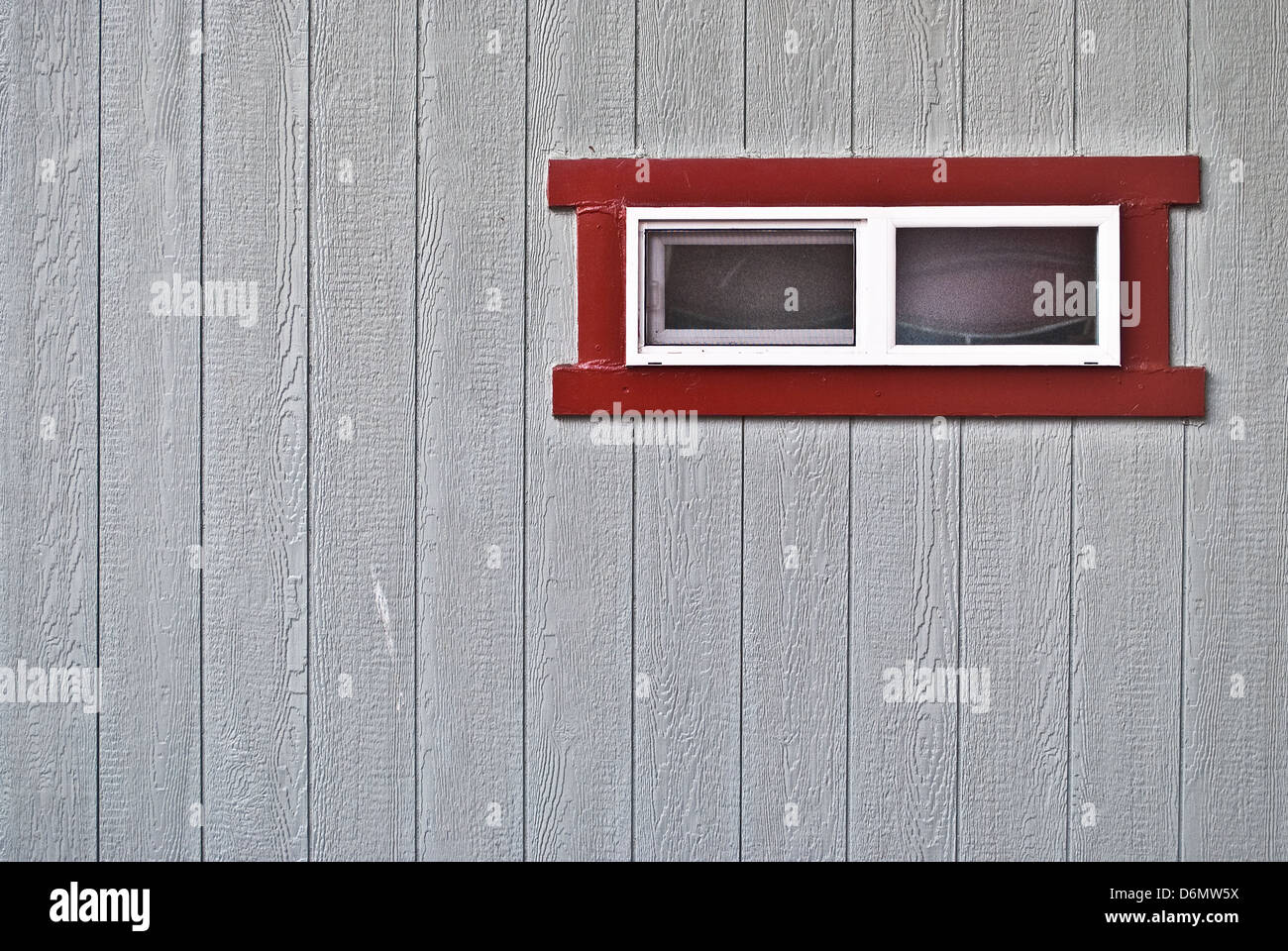 Red Framed Window on Exterior Grey or Gray Wooden Wall Stock Photo - Alamy