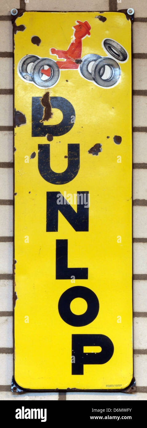 This Dunlop enamel advertisement sign, displayed at the Den Hartog Ford ...