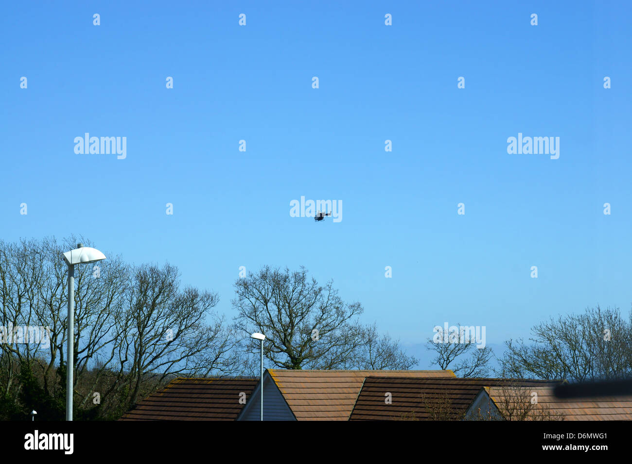 medical police helicopter hovering landing clear sky Stock Photo - Alamy