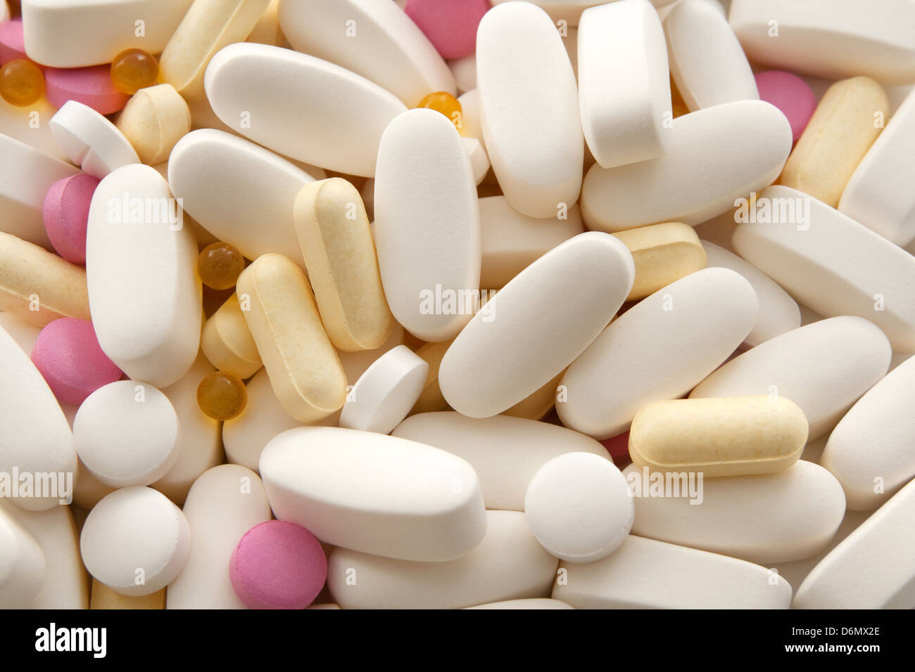 Medical background, pills of different colors and sizes Stock Photo - Alamy