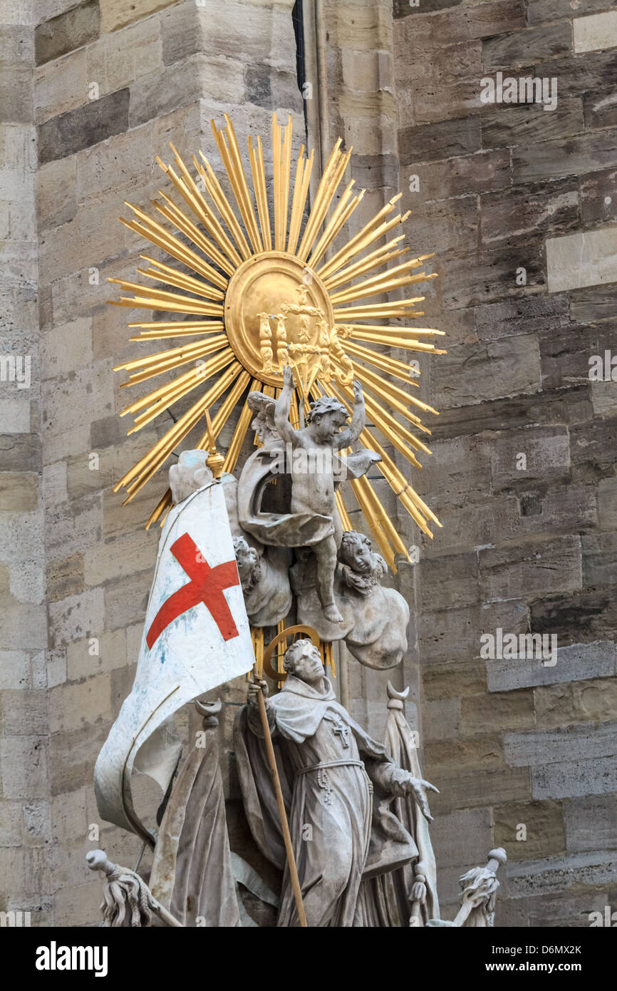 Catholic stone statue behind St. Stephan in Vienna Stock Photo - Alamy