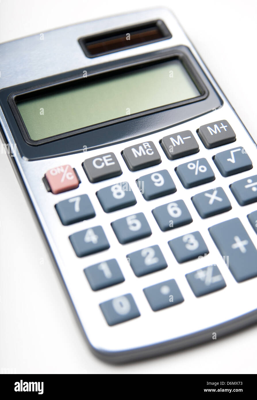 Silver calculator on white background. Shallow depth of field Stock ...