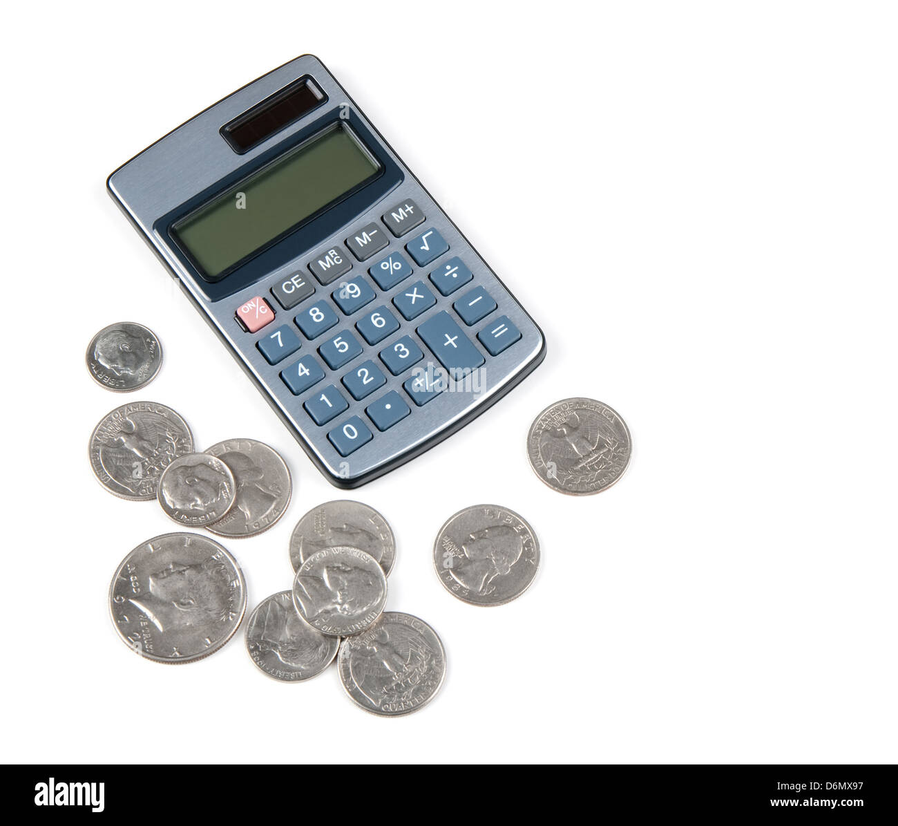 Calculator and US coins on white background Stock Photo - Alamy