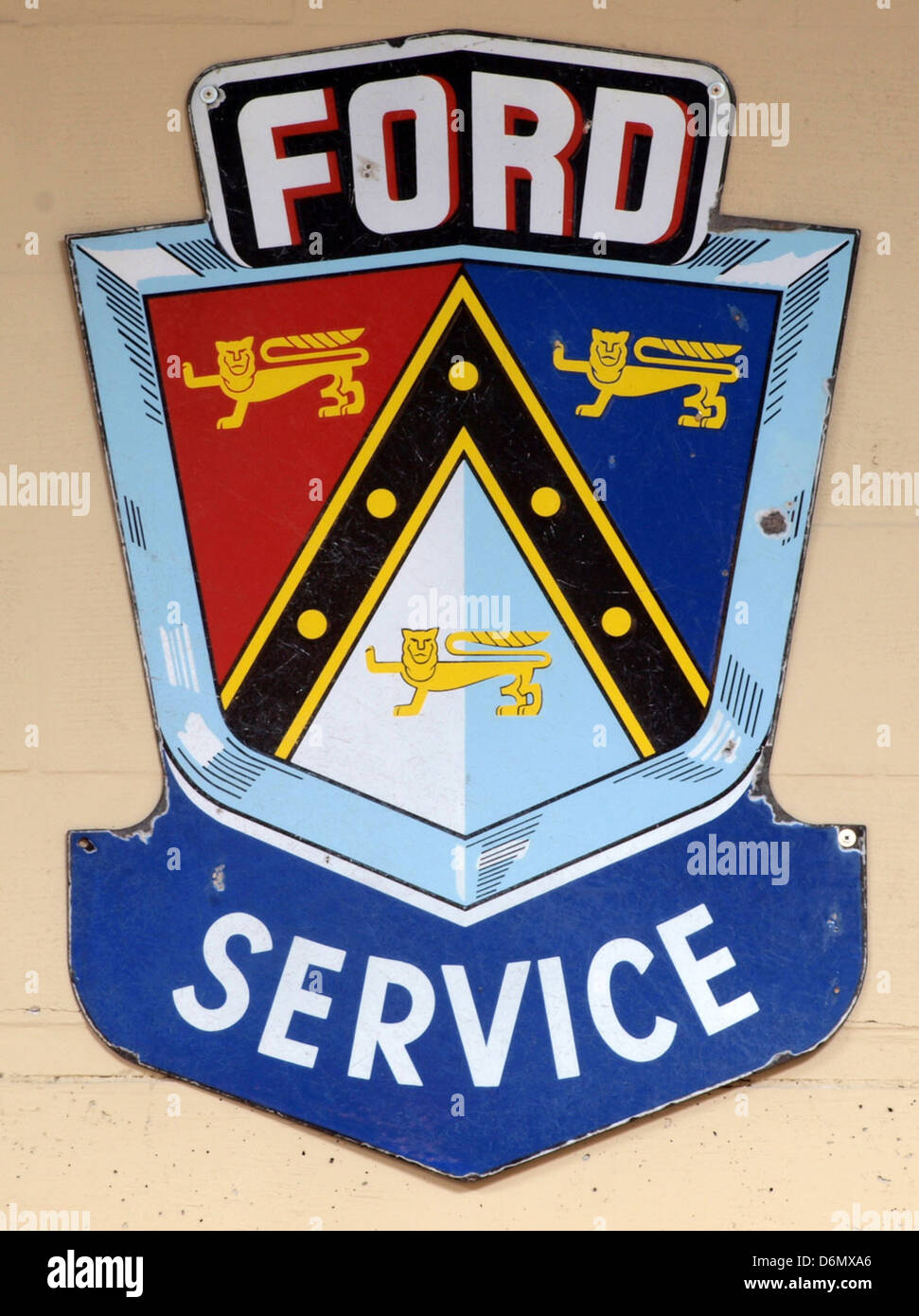A Ford service enamel advert sign displayed at the Den Hartog Ford ...