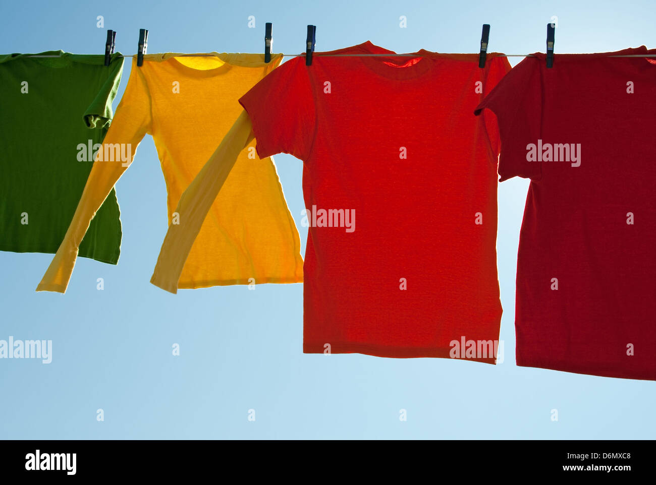 Clothes drying in the wind on a clothes line hi-res stock photography ...