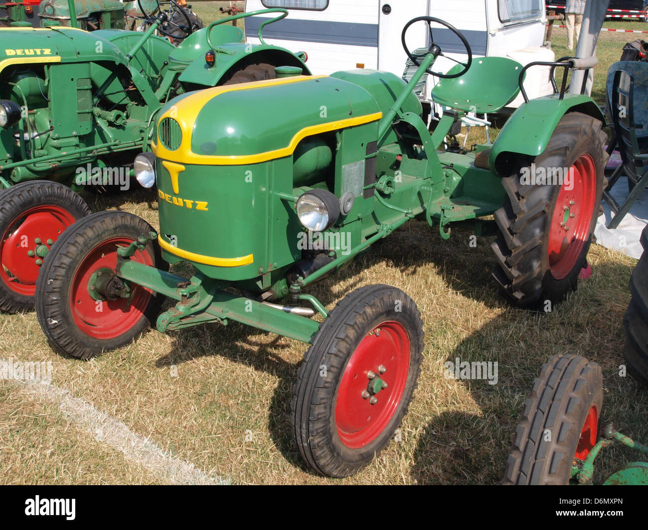Green Deutz with red wheels Stock Photo - Alamy