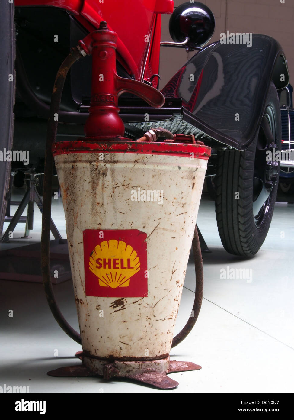 The old Shell oil pump is a vintage gasoline dispenser associated with ...