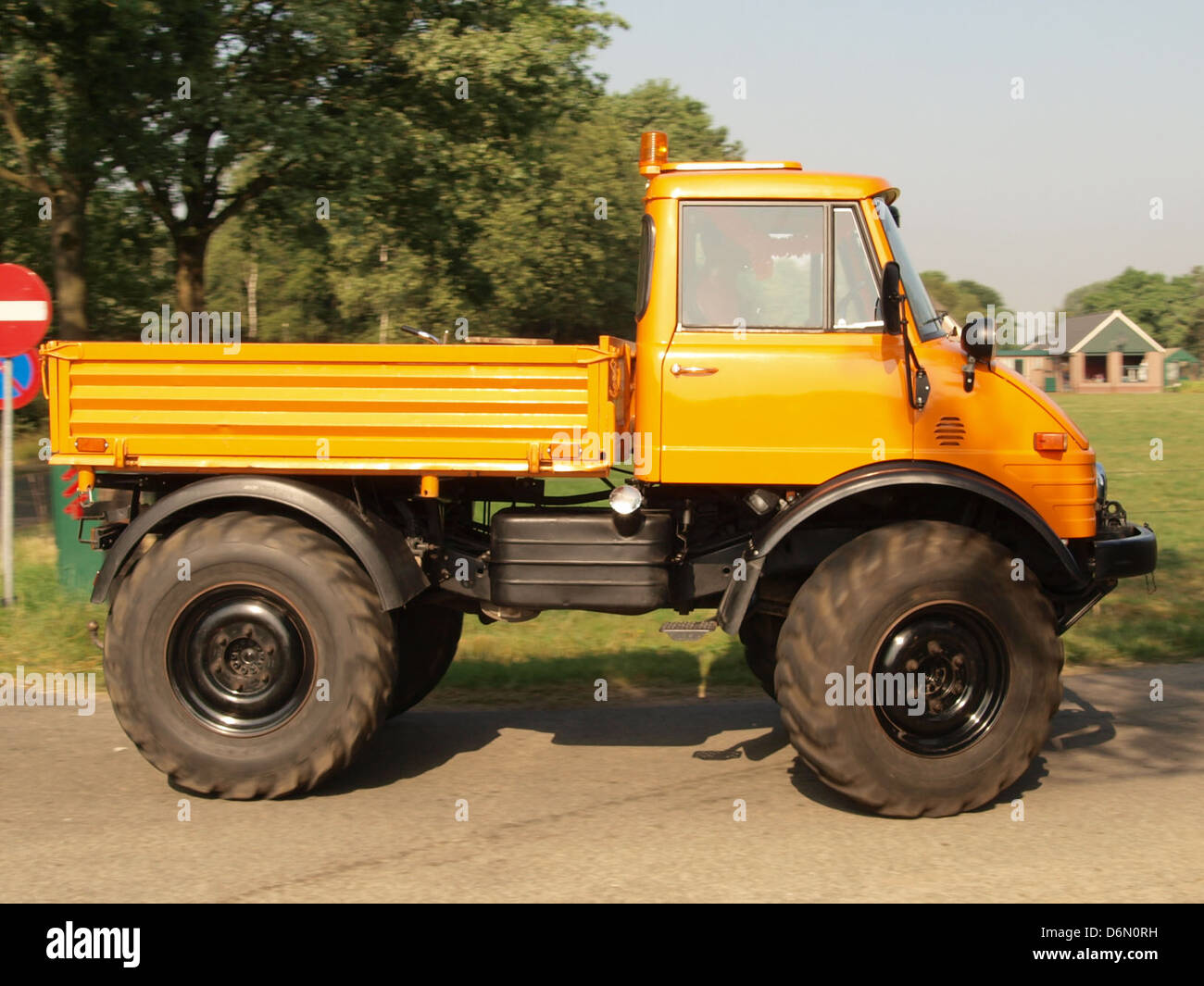 Orange Mercedes Unimog pic2 Stock Photo - Alamy