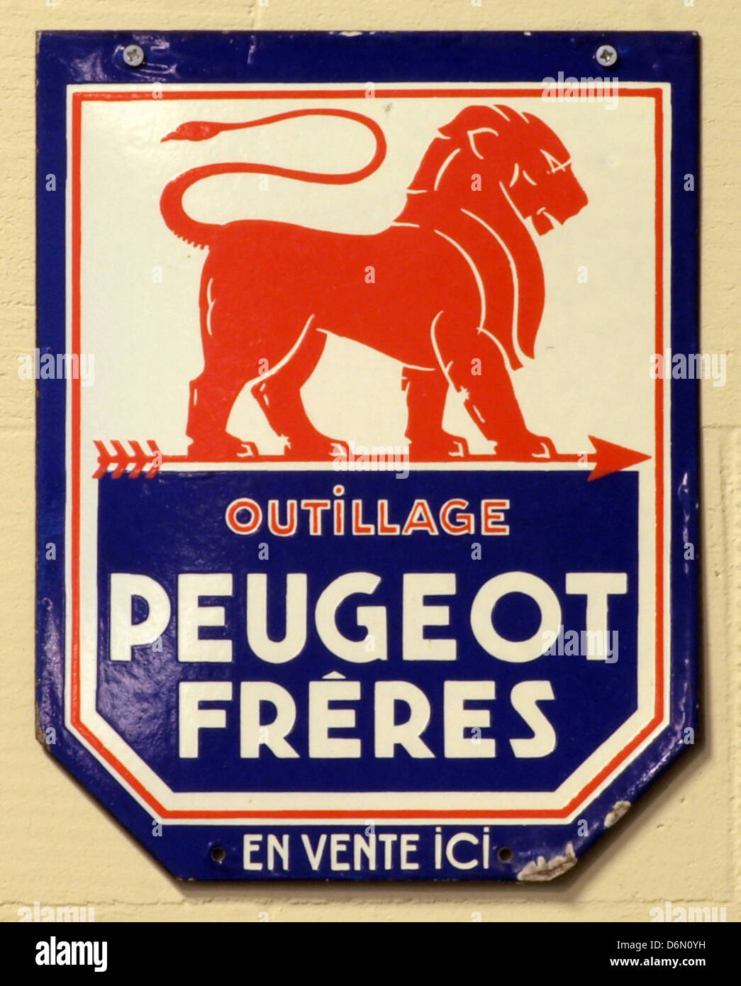 The Peugeot enamel advert sign is a vintage advertising piece ...