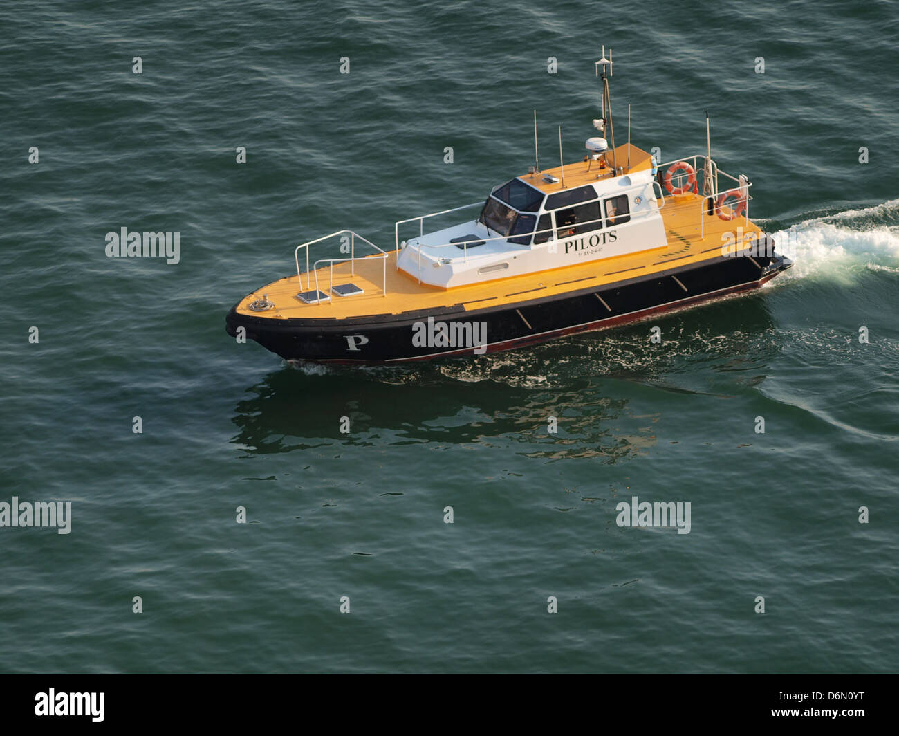 A pilot boat at Barcelona, used for guiding ships safely into port ...