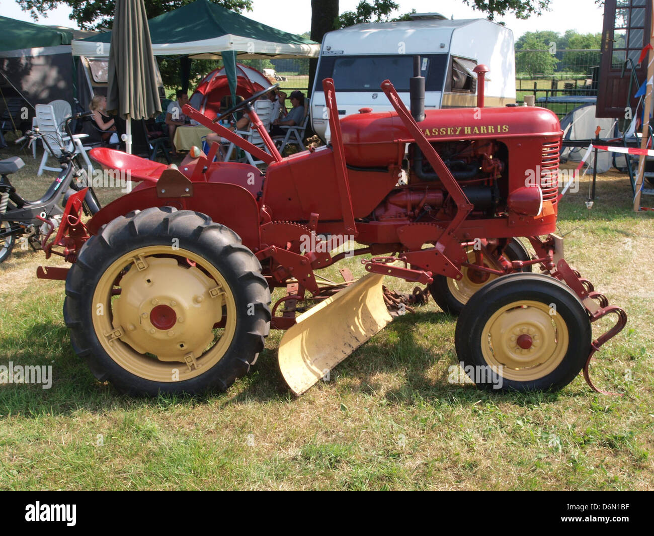 The Red Massey Harris tractor is a classic agricultural vehicle ...