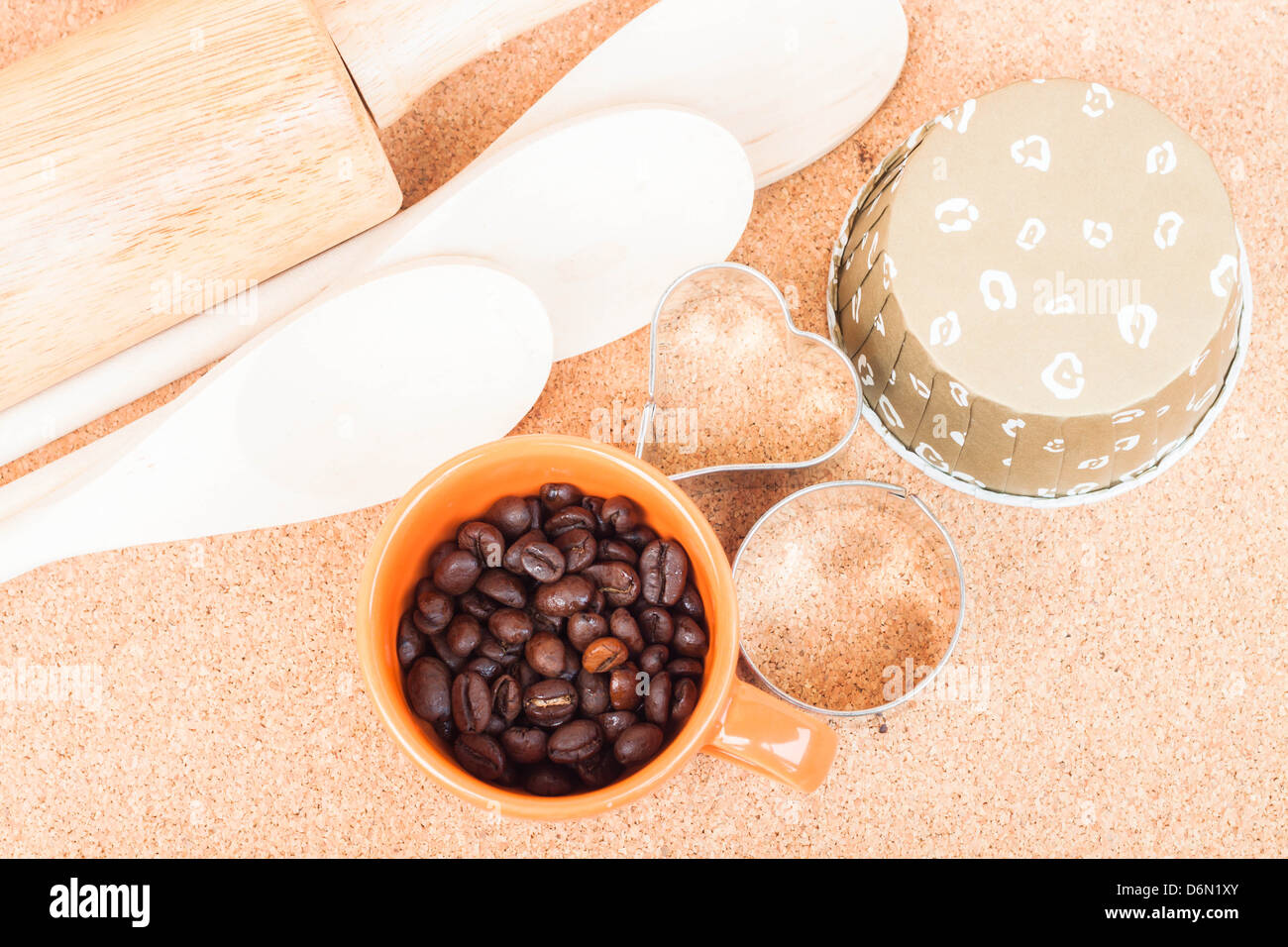 Cup of coffee bean and bakery equipment on table Stock Photo - Alamy