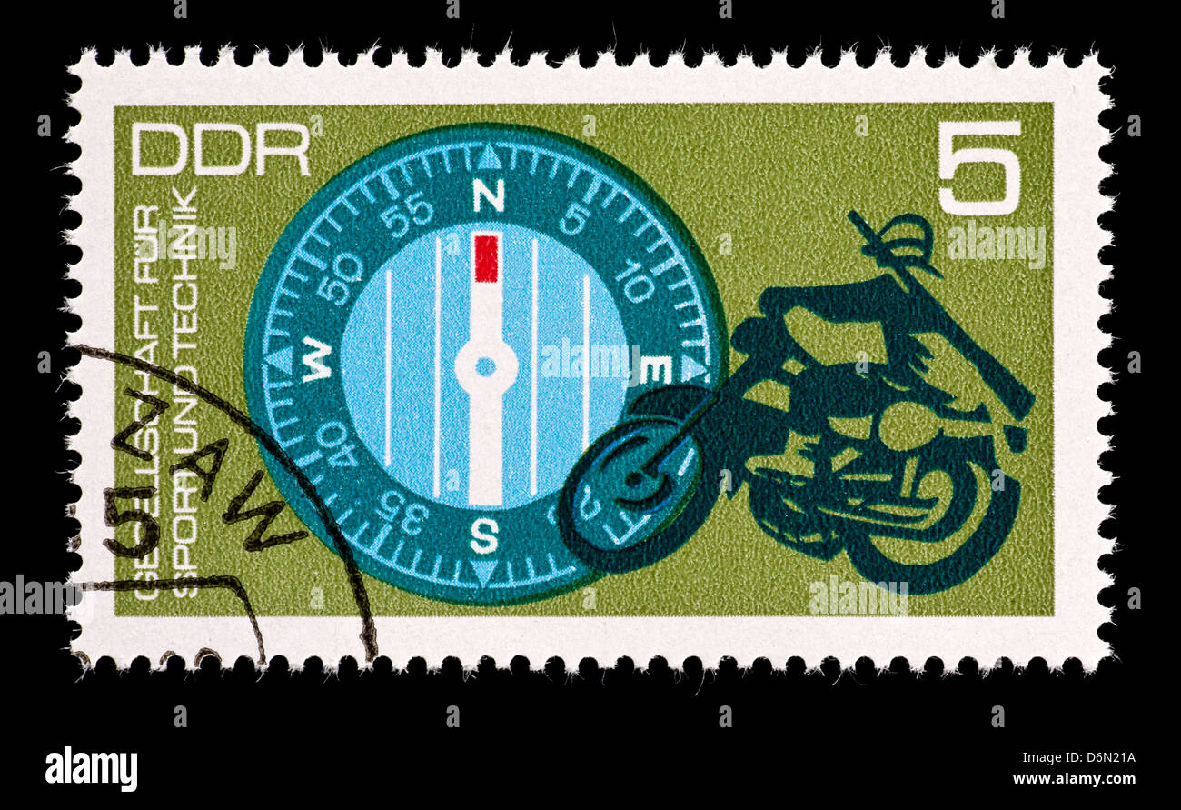 Postage stamp from East Germany (DDR) depicting a compass and ...