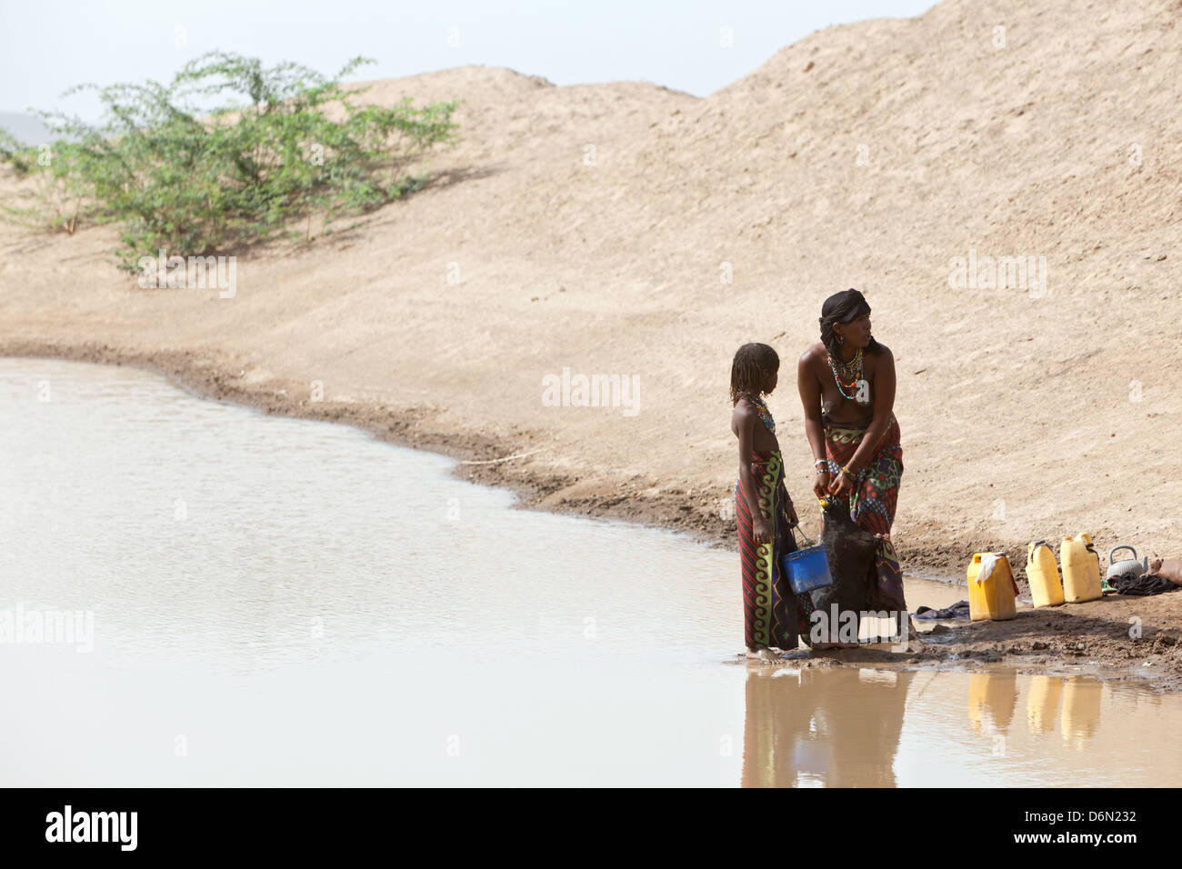 Ethiopian girl fetching water hi-res stock photography and images - Alamy