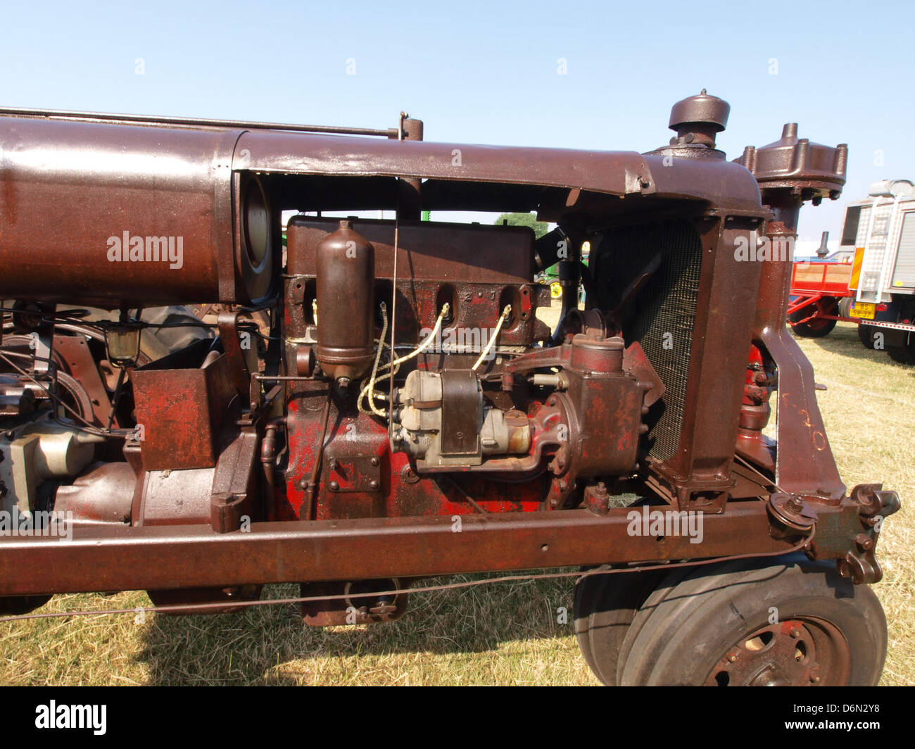 This image shows a very old, unidentified tractor, showcasing early ...