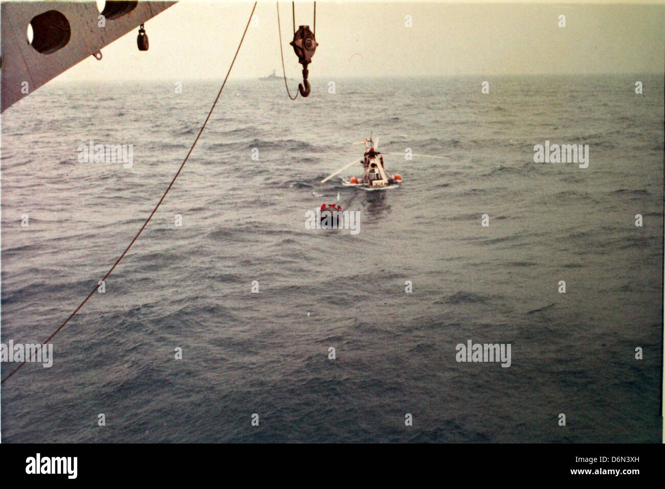 The Navy HS-2 helicopter is shown being repaired aboard the USS Hornet ...
