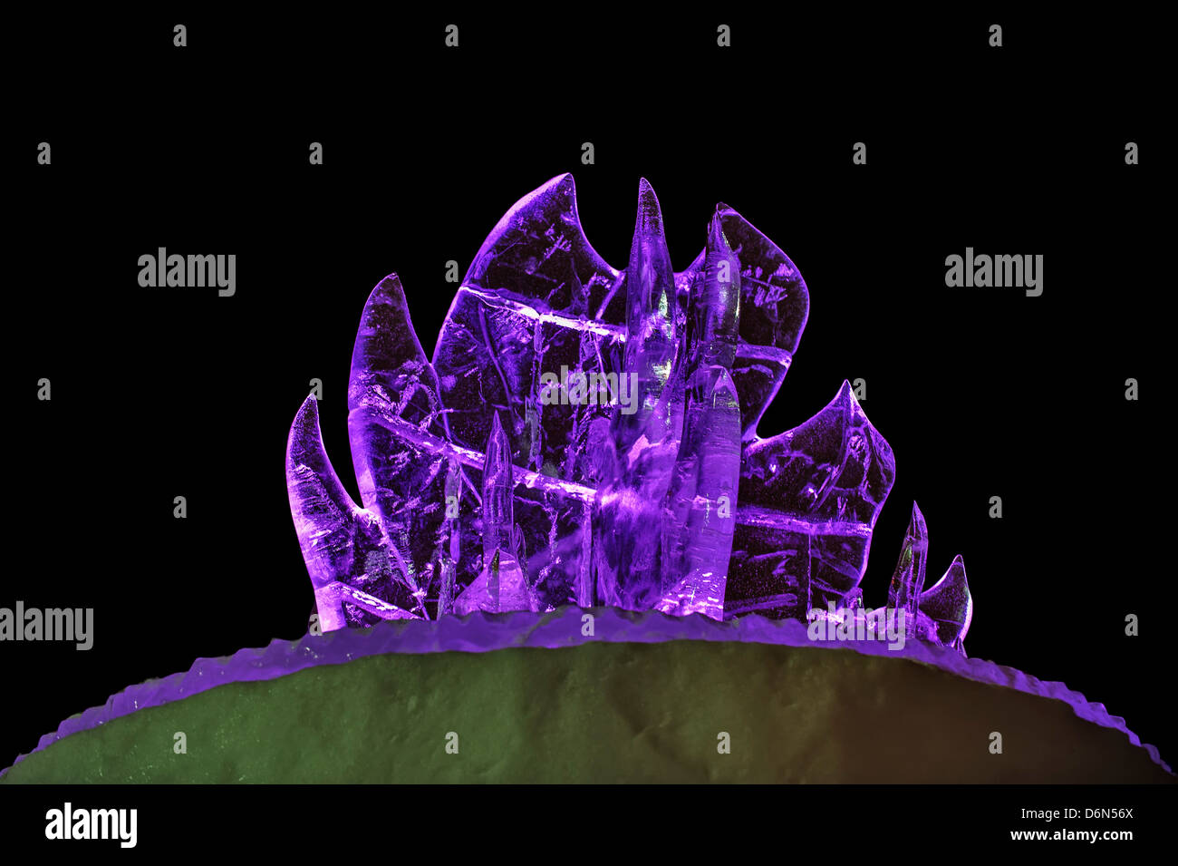 Ice fire sculpture over black background Stock Photo - Alamy
