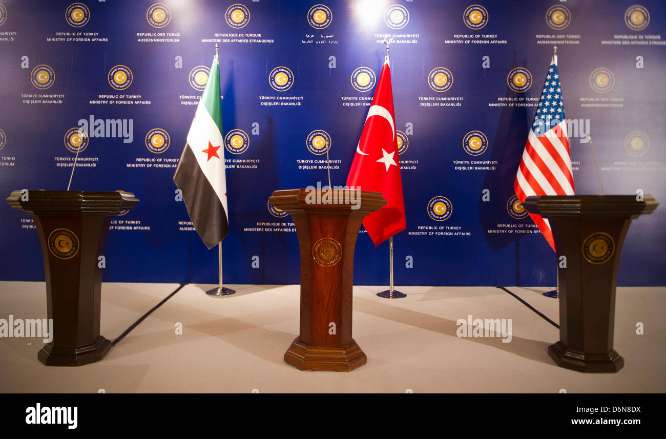 The Syrian, Turkish and US flag stand behind The empty lecterns during ...