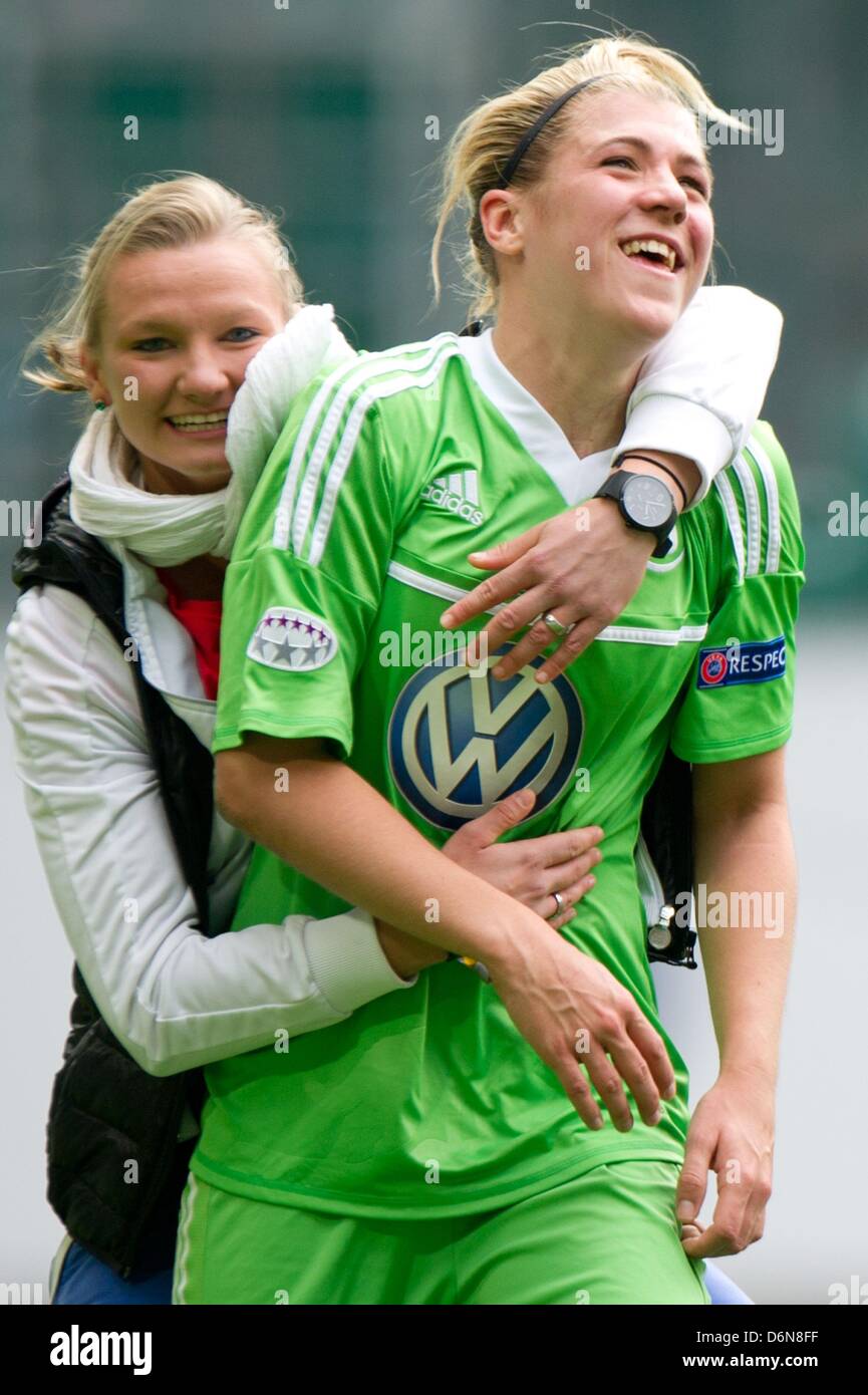 Wolfsburg's Alexandra Popp (L) gestures with Luisa Wensing after the ...