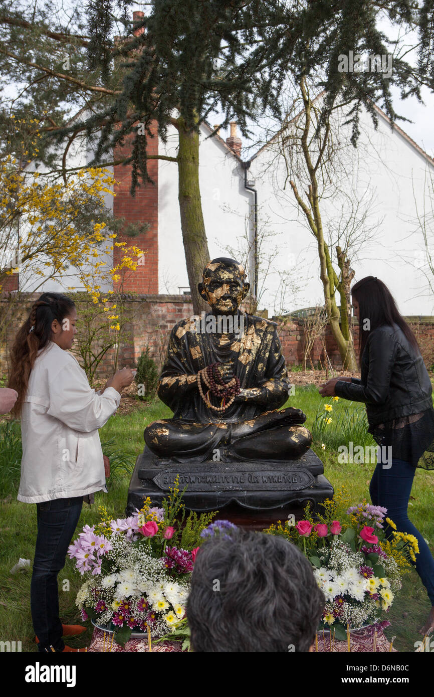 A religious statue covered in gold leaf hi-res stock photography and ...