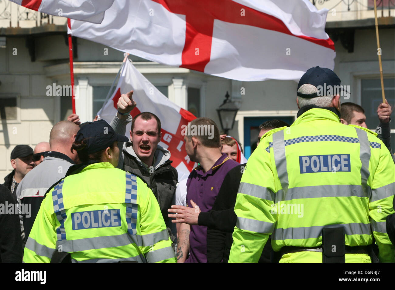 London, UK. 21st April, 2013. EDL supporters take part in a "March for ...
