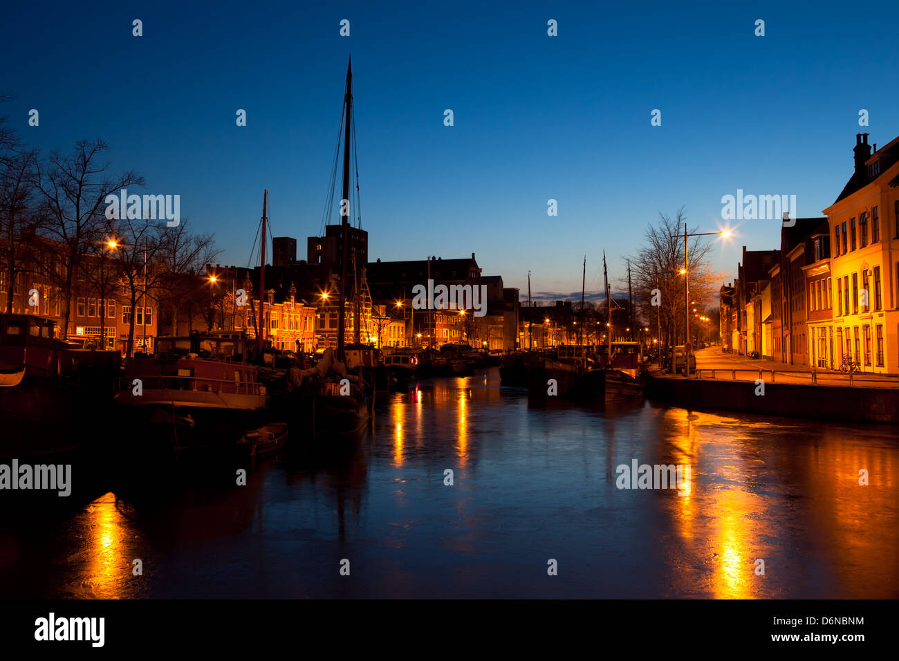 ship on canal in Dutch city at night, Groningen Stock Photo - Alamy
