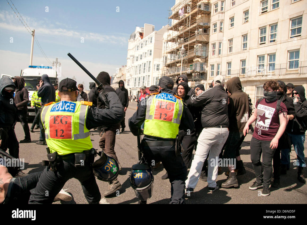 Brighton, UK. 21st April, 2013. Disorder breaks out as riot police ...