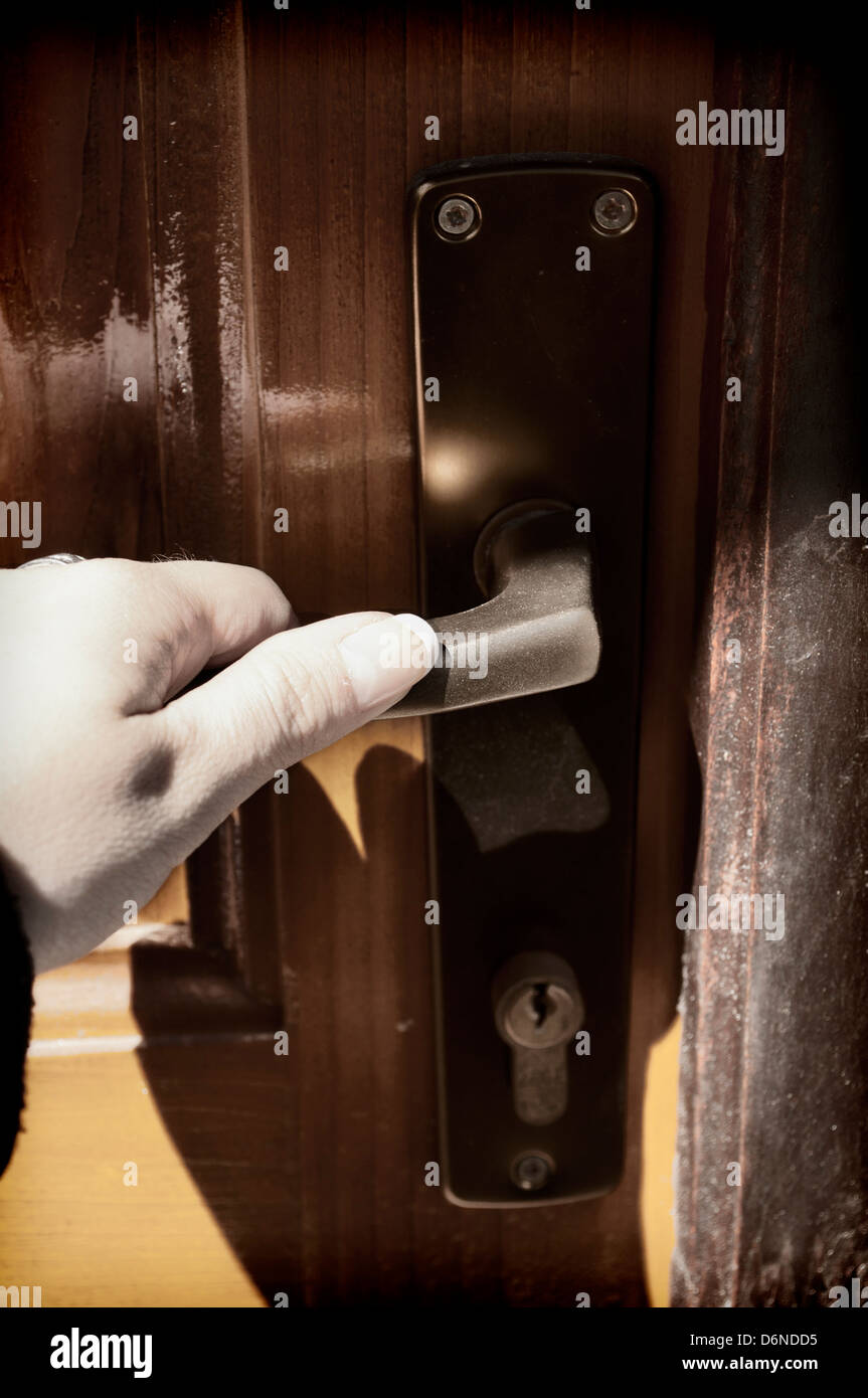 Woman hand on door handle hi-res stock photography and images - Alamy