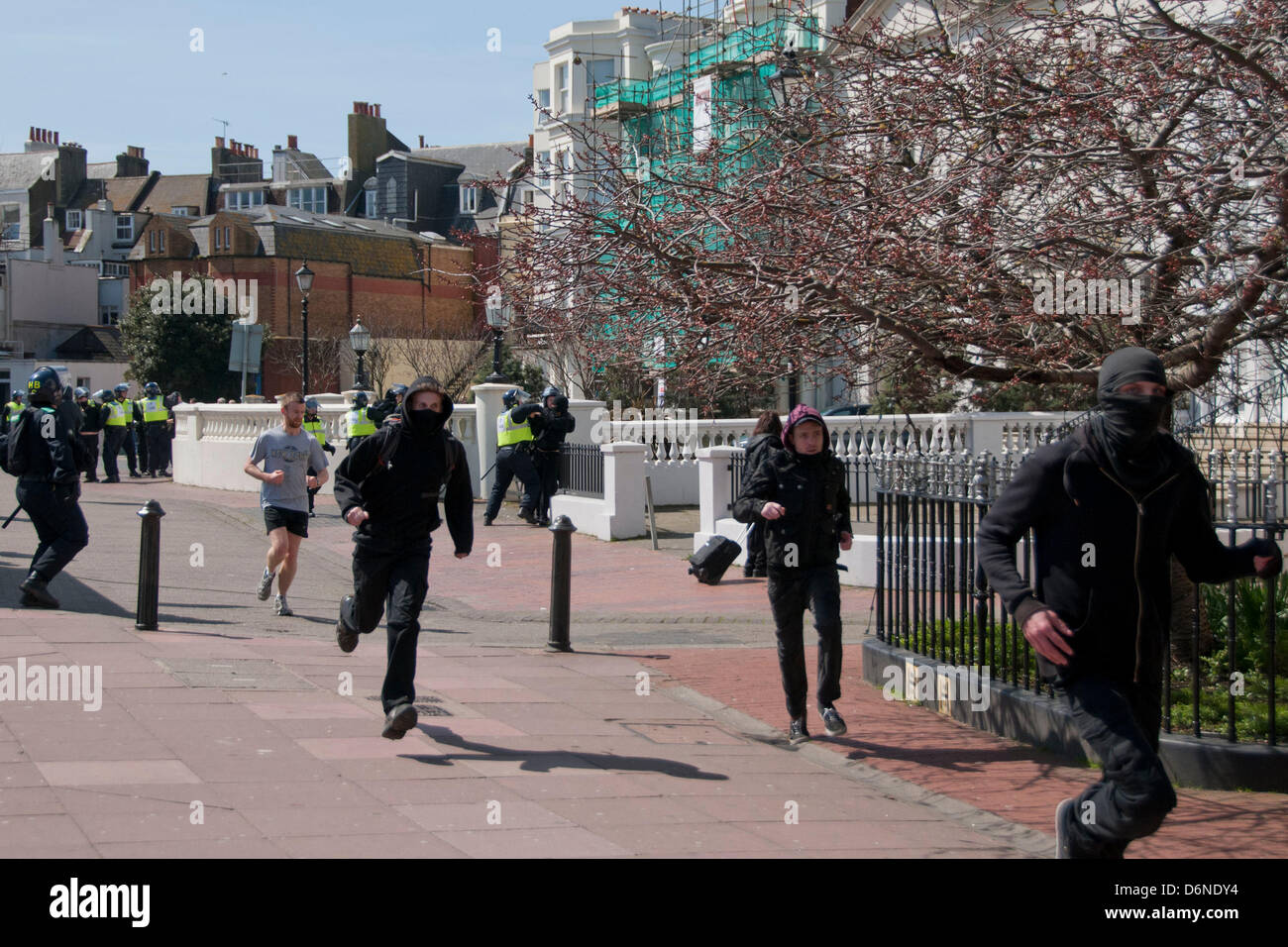 Brighton, UK. 21st April, 2013. Disorder breaks out as riot police ...
