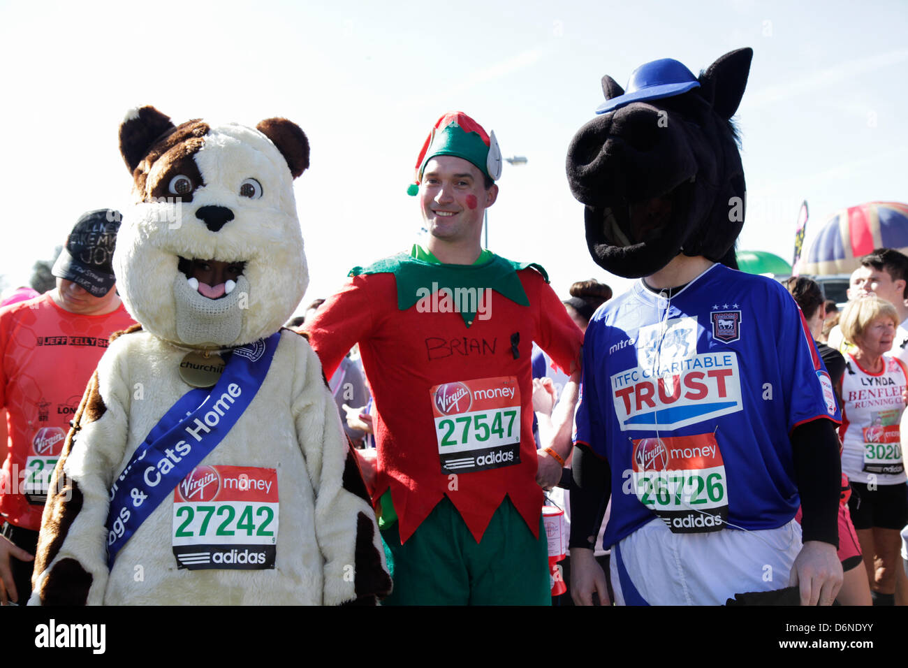 London, UK. 21st April, 2013. Runners in fancy dress at the start of ...