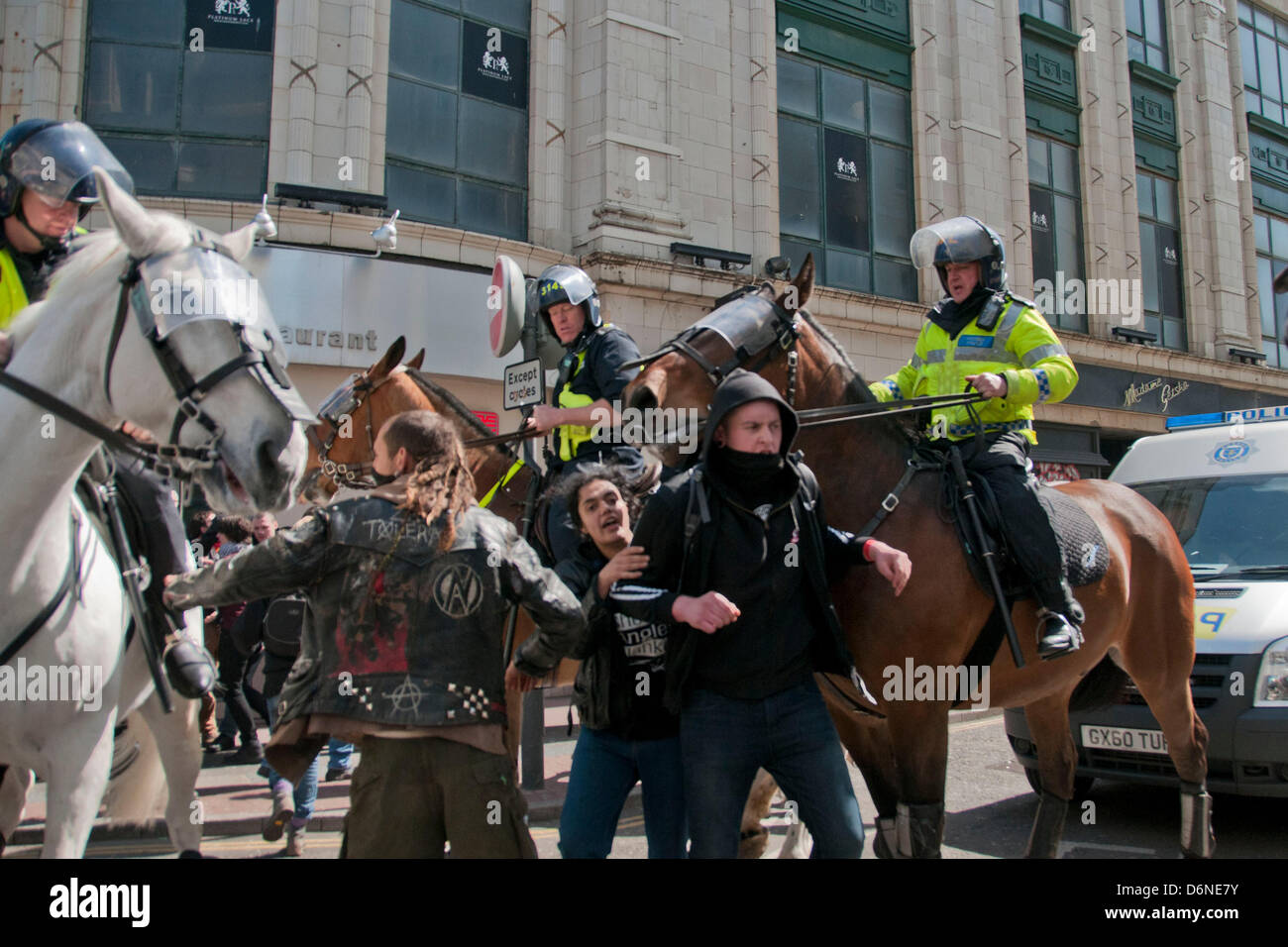 Brighton, UK. 21st April, 2013. Disorder breaks out as riot police ...