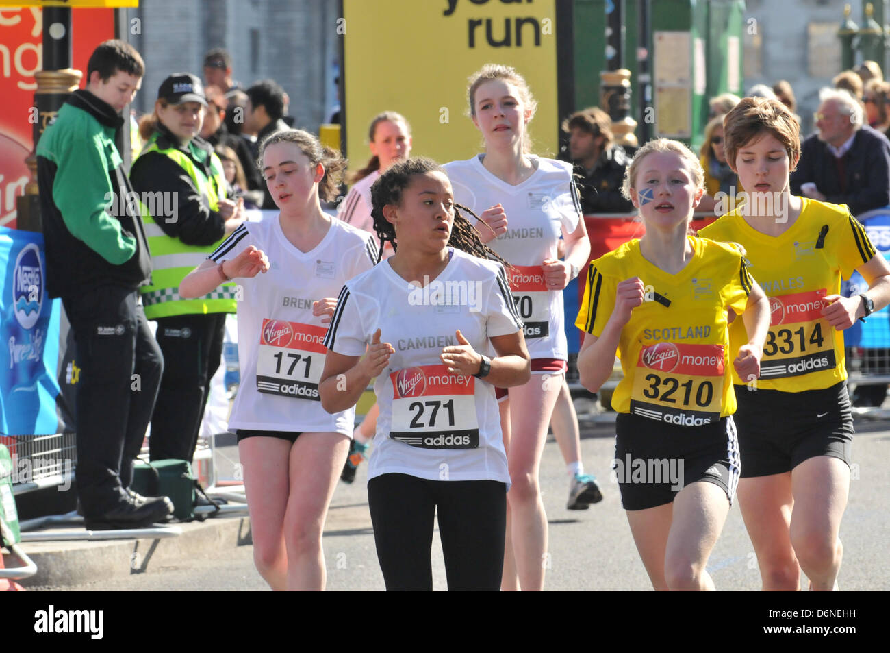Westminster, London, UK. 21st April 2013. A group of girls running the ...
