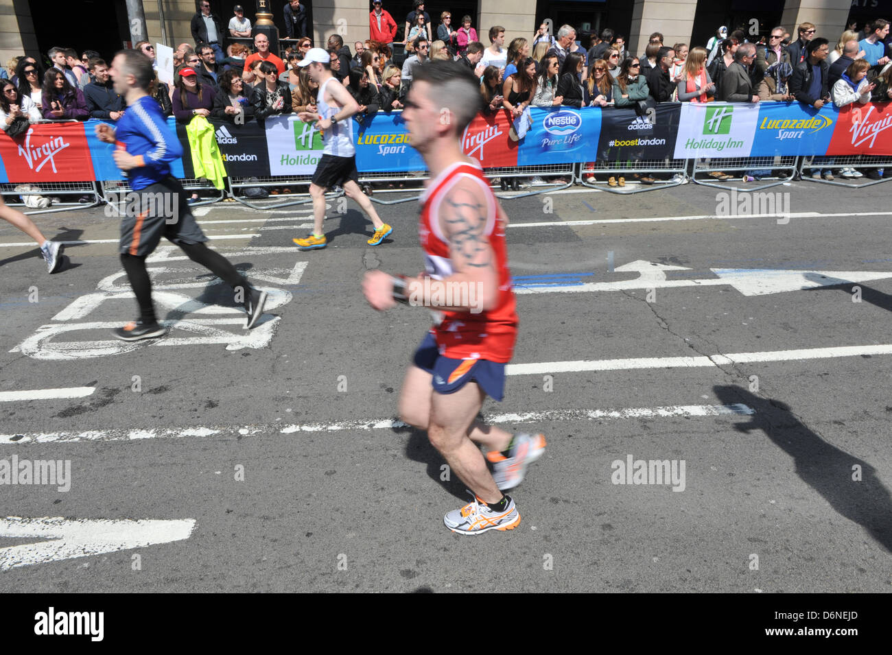 Westminster, London, UK. 21st April 2013. Runners and the crowd at the ...