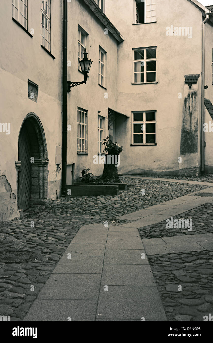Retro style photo of typical European old town street Stock Photo - Alamy