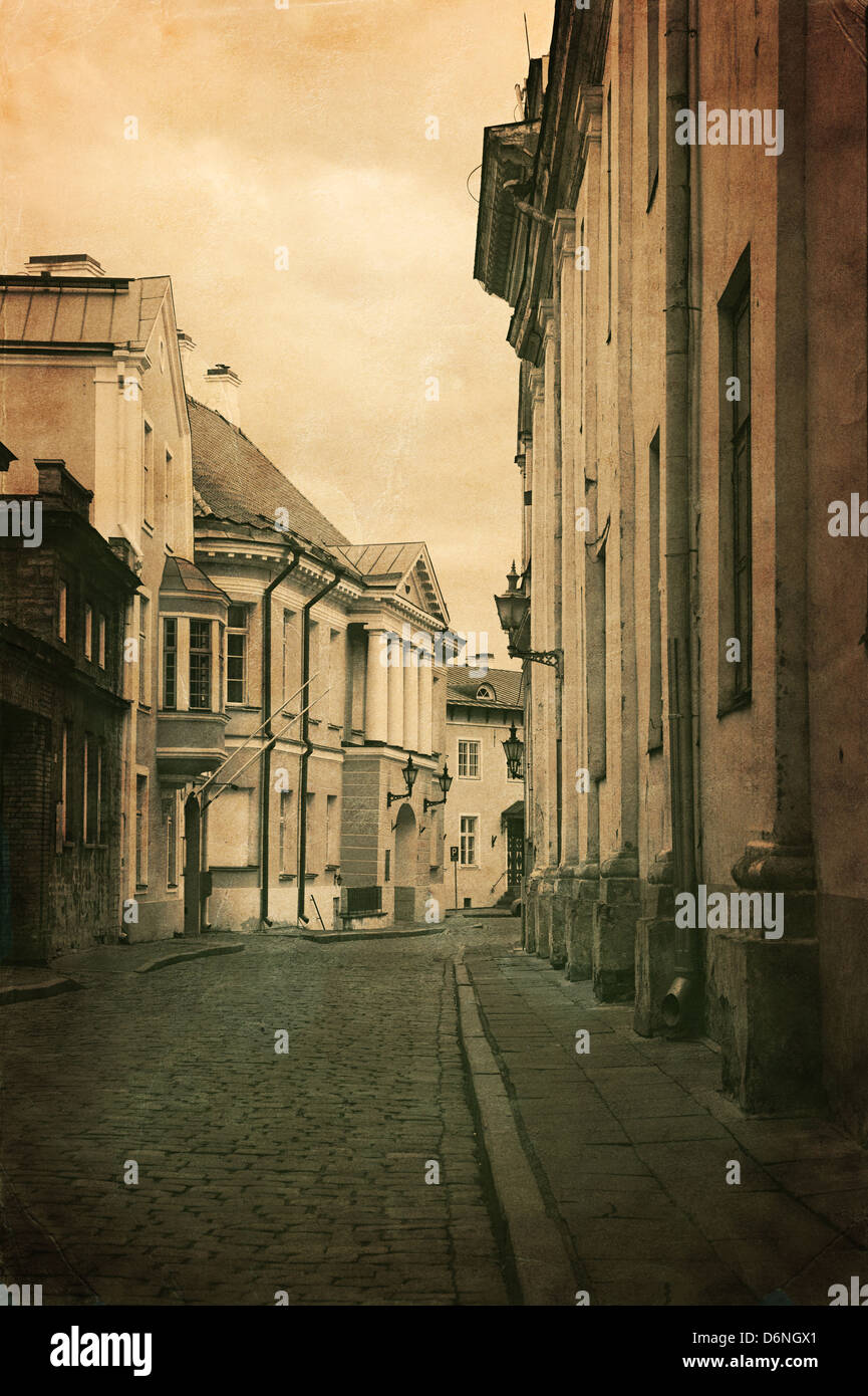 Vintage style photo of old European town street Stock Photo - Alamy