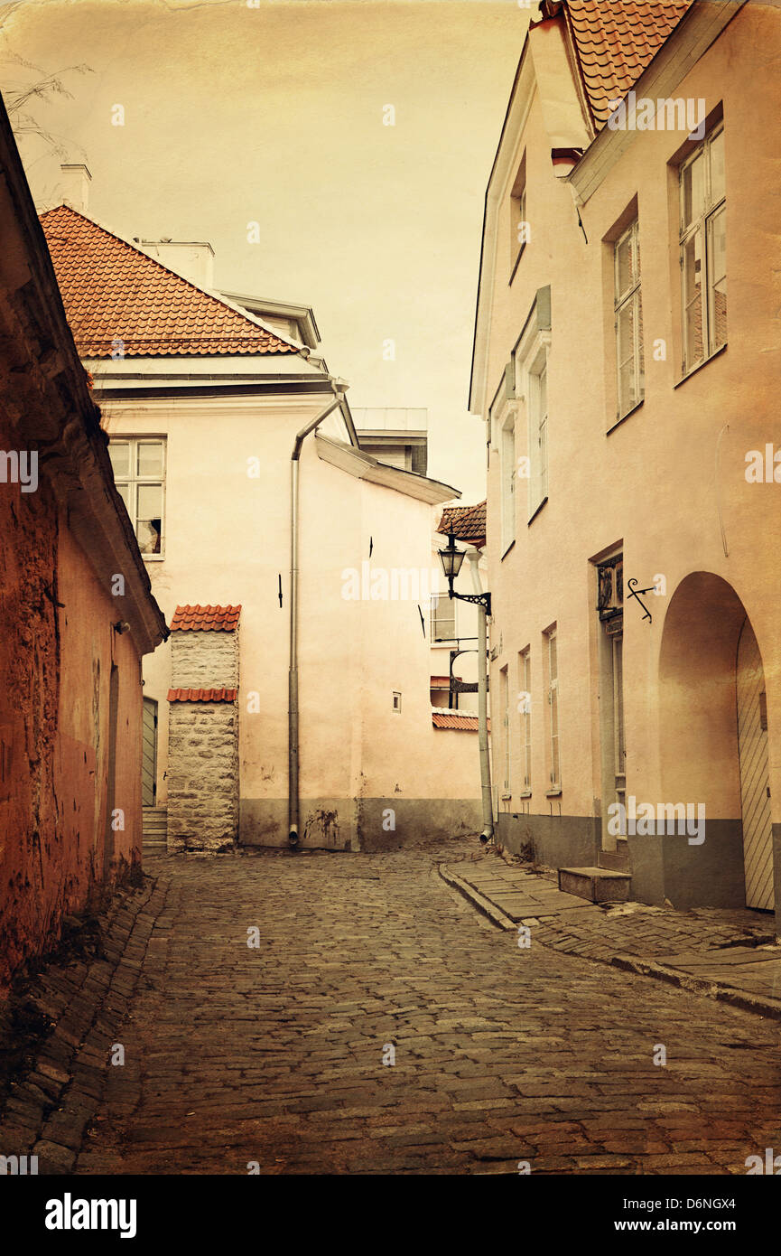 Vintage style photo of old European town street Stock Photo - Alamy