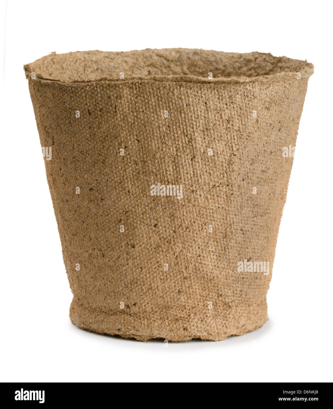 Empty peat pot isolated on white Stock Photo - Alamy
